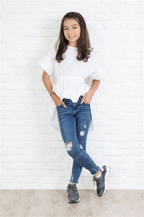 Premium Photo Portrait Of Happy Cute Girl Smiling Looking At Camera