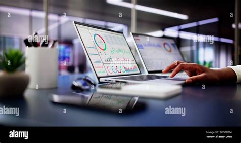 Female African American Data Analyst Predicting Market Trends On Virtual Kpi Dashboard In