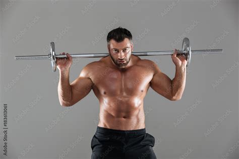 Portrait Of A Concentrated Strong Shirtless Male Bodybuilder Stock
