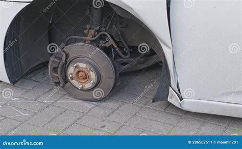 Car Damaged In Road Accident With Chassis Dent At Wheel Arch And