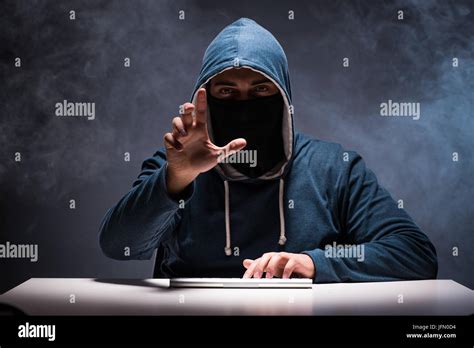 The Computer Hacker Working In Dark Room Stock Photo Alamy