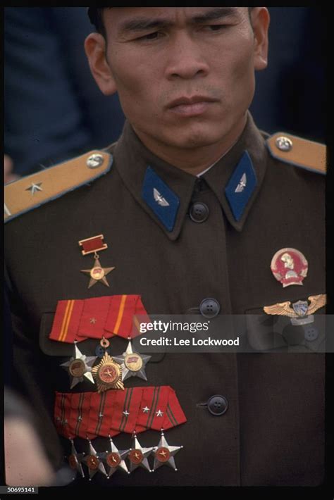 Officer From North Vietnam Viewing Tenth Anniversary Celebration Of
