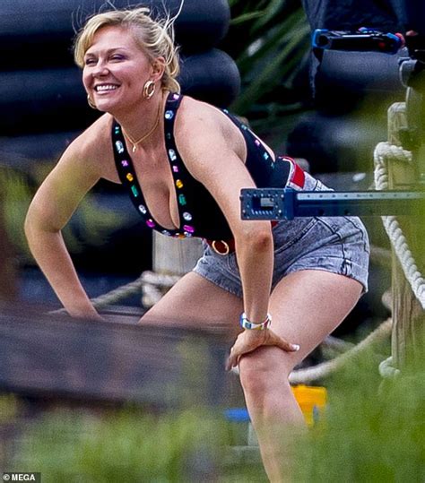 Kirsten Dunst Dances In Cleavage Bearing Bedazzled Swimsuit And Daisy