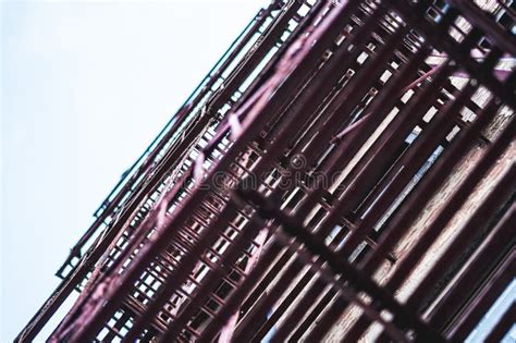 Abstract Perspective Of A Building S Structural Framework With Geometric Patterns And Industrial