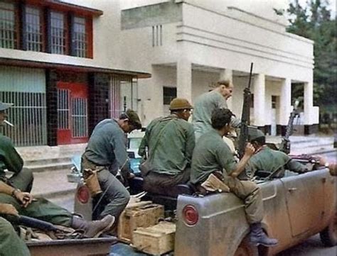Rip Robertson In The Congo Center With Cap And Glasses Credit