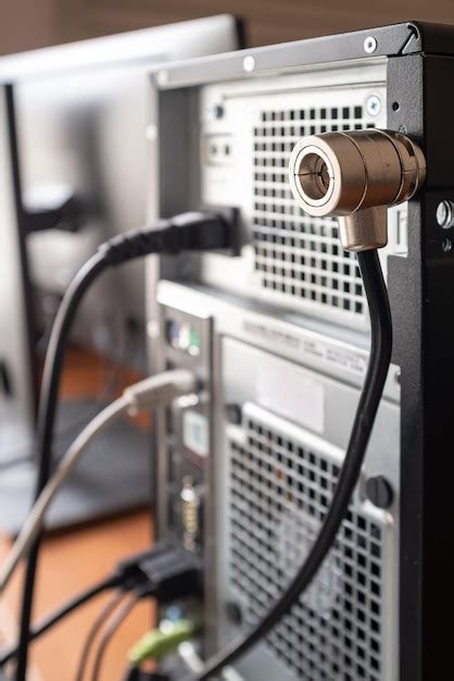 Premium Photo Security Lock Is Installed On The Computer To Prevent Theft And Ensure The