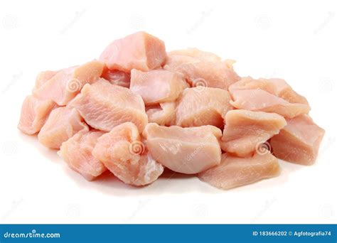 Pile Of Fresh Diced And Sliced Raw Chicken Breast Cube Form Isolated On White Background Stock