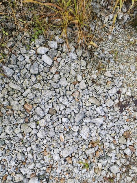 The Surface Ground Texture Of Rural Pathway Made Up Of Aggregated