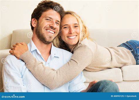Happy Young Couple At Home On Sofa Stock Image Image Of Adults Love