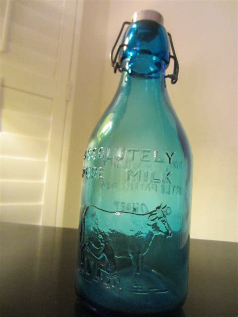Italian Absolutely Pure Milk Blue Glass Bottle For Sale