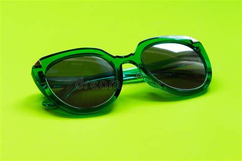 Stylish Retro Green Glasses With Shadow And Reflection Of The Sky In
