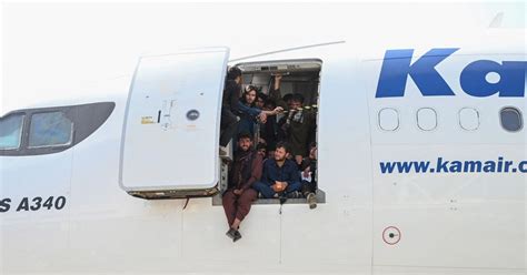 Videos Show Desperation At Kabul Airport As Afghans Crowd Planes Cling