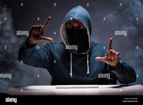 Computer Hacker Working In Dark Room Stock Photo Alamy