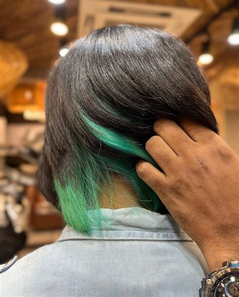 All The It Girls Are Rocking Black Hair With Peekaboo Highlights