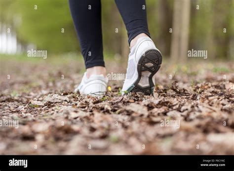 Feet Of A Running Woman Stock Photo Alamy