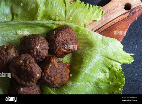 Fried Cooked Beef And Pork Meat Balls On Lettuce Leafs Closeup Stock