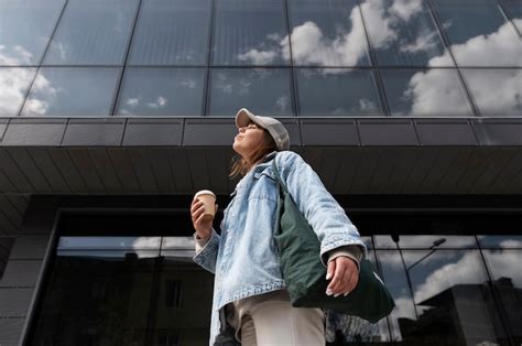 Free Photo Young Woman Wearing Trucker Hat