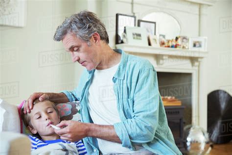 Father Checking Son S Temperature Stock Photo Dissolve
