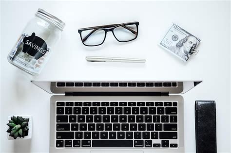 Premium Photo Finance Courses Online Budget Planner Word Finance Laptop Mason Jar Saving Bank