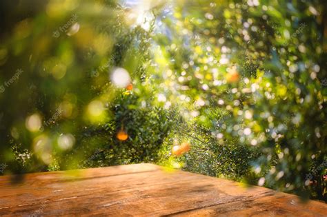 Premium Photo Empty Wood Table With Free Space Over Orange Trees