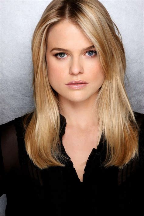 Download Alice Eve Posing In A Stylish Outfit At A Photoshoot Wallpaper