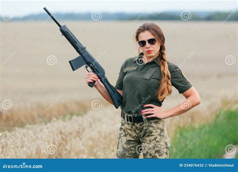 Soldier Woman In Military Uniform A Girl In A Military Uniform With A