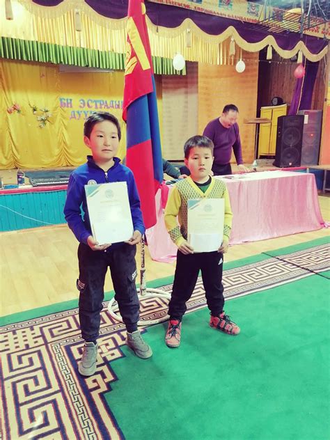 МОНГОЛ ЦЭРГИЙН БАЯРЫН ӨДӨРТ зориулан ЕБС ийн сурагчдын дунд зохион байгуулсан үндэсний бөхийн