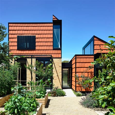 Diamond Scalloped And Brick Shaped Shingles Cover Melbourne House By