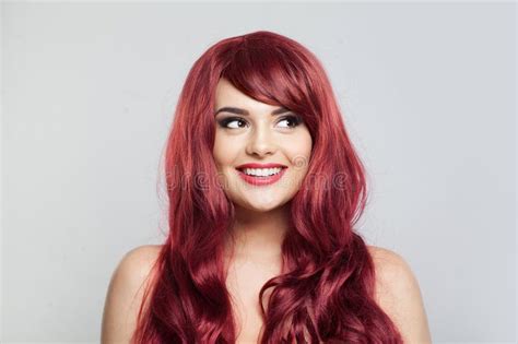 Attractive Joyful Woman Fashion Model With Long Healthy Shiny Wavy Hair