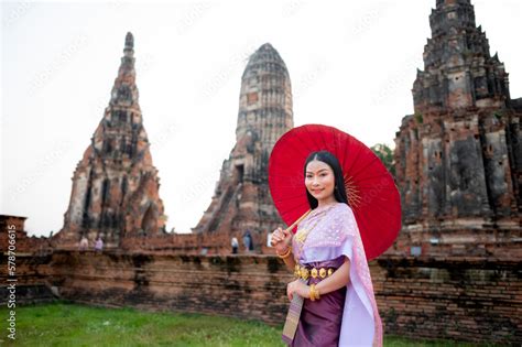 Beautiful Thai Girl In Traditional Dress Costume Red Umbrella As Thai
