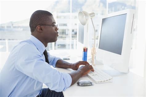Premium Photo Focused Businessman Working At His Desk