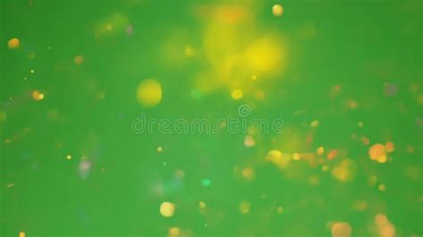 quick flashes that resemble falling stars against green green screen chromakey stock footage