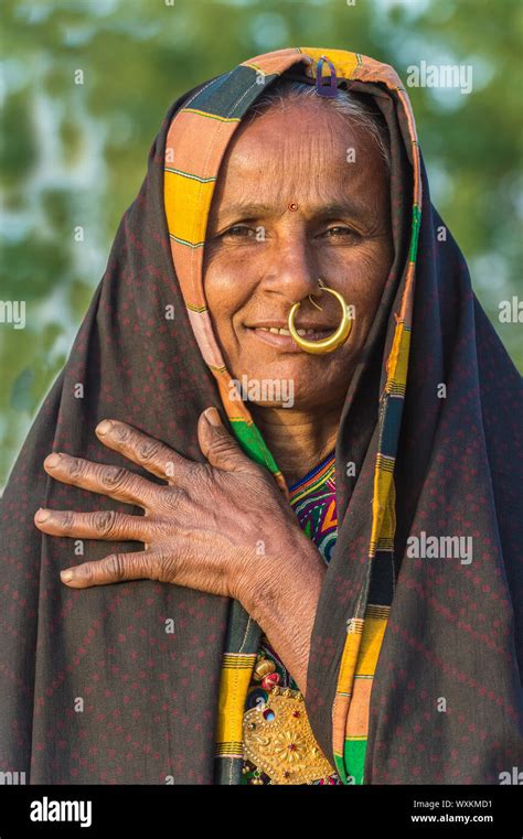 Elderly Ahir Woman In Traditional Clothes With A Nose Ring Hi Res Stock