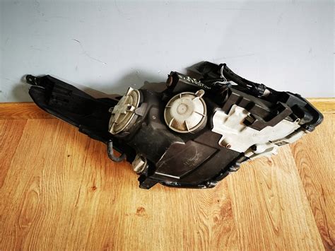 TOYOTA AVENSIS T LAMPA LEWA PRZÓD ANGLIK oficjalne archiwum Allegro