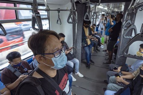 Metro Manila Philippines Commuters Inside The Passenger Car Of The