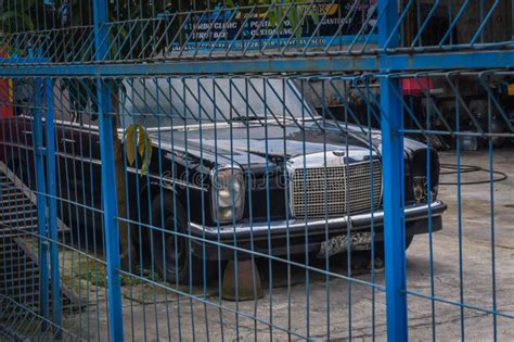 Broken Black Mercedes Benz 200 W115 On Car Workshop Editorial Photo