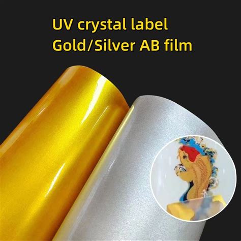 0 6 100m UV Dtf Ab Film Roll Sticker Golden Silver Color For Wood Glass