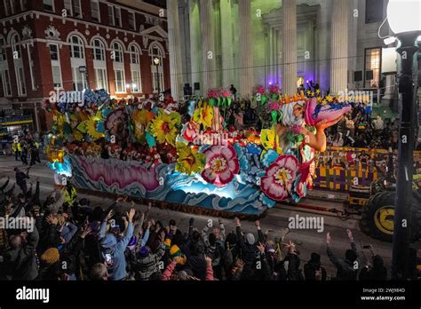 Paradegoers Are Seen During The Krewe Of Orpheus Mardi Gras Parade In