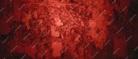 어두운 빨간색 벽 질감 배경 할로윈 배경 긁힌 자국이 있는 무서운 빨간색과 검은색 그런 지 배경 프리미엄 사진