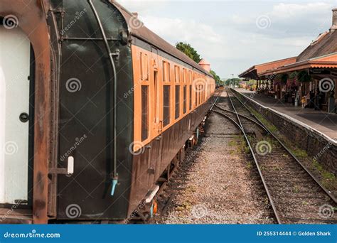Restored Victorian Era Passenger Rail Train At A Train Station Stock