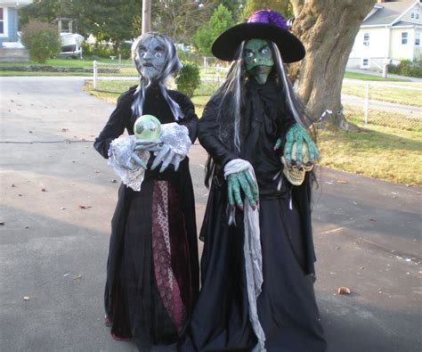 Two People Dressed Up In Halloween Costumes
