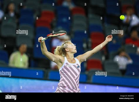 Katerina Siniakova Of Czech Republic Serves Against Caroline Garcia Of