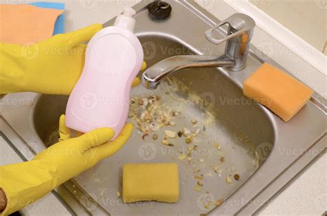 Cleaner Shows Liquid Cleanser Detergent Bottle At Dirty Kitchen Sink