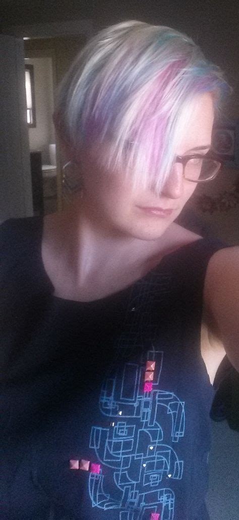 two pravana colors chunked onto bleach blonde hair wild orchid and