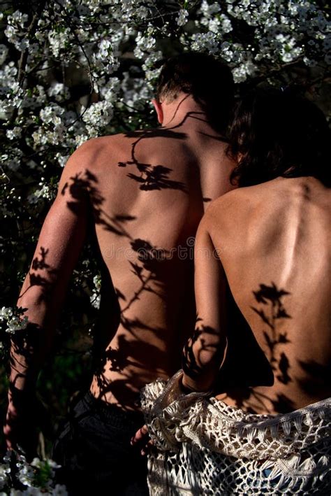 Sensual Couple In Cherry Bloom Naked Woman Man In Love In Blossoming