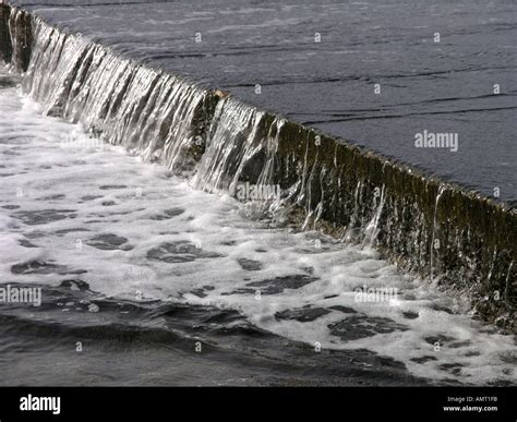 Water Flowing Over A Concrete Step Stock Photo Alamy