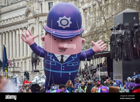 London Uk 01st Jan 2024 Participants Carrying A Policeman Float