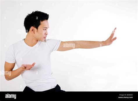 Asian Man Doing Martial Arts Exercises Stock Photo Alamy