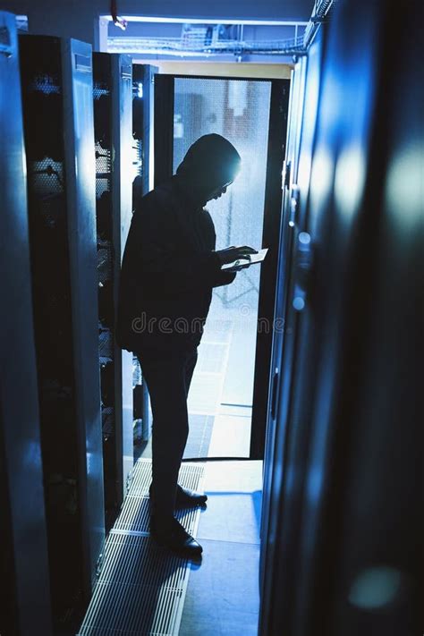 Im About To Score Big A Hacker Using A Digital Tablet In A Server Room