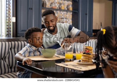 African American Father Pouring Milk Bowl Stock Photo 2288414541 | Shutterstock